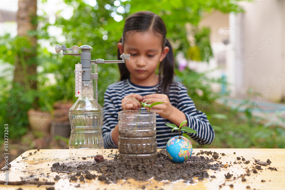 Blurred of little girl is learning science experiment at home and ...