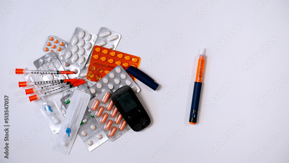 Pile of medicines on white background. Tablets and capsules that ...