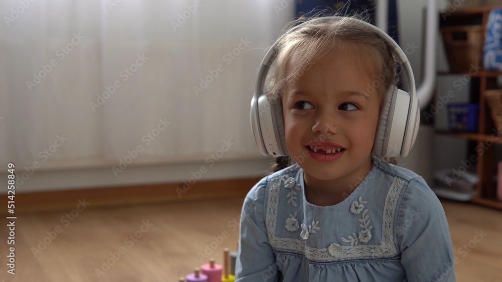 Child Listening Music In Big White Headphones. Happy Little Preschool ...
