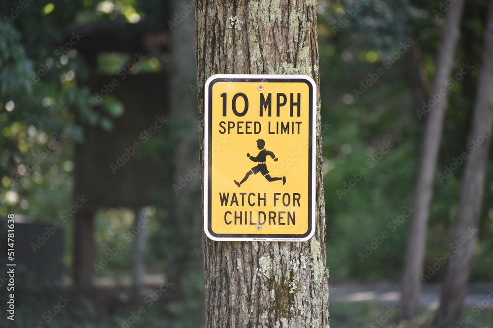 Warning sign speed limit for children at play Stock Photo | Adobe Stock