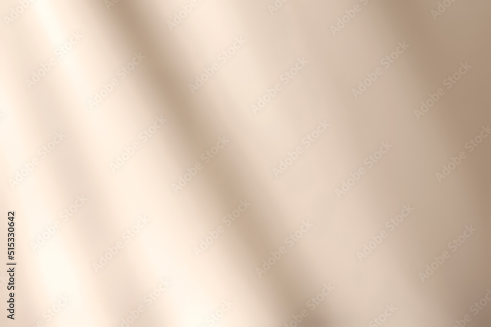 Abstract diagonal window shadows and light on solid beige wall texture ...