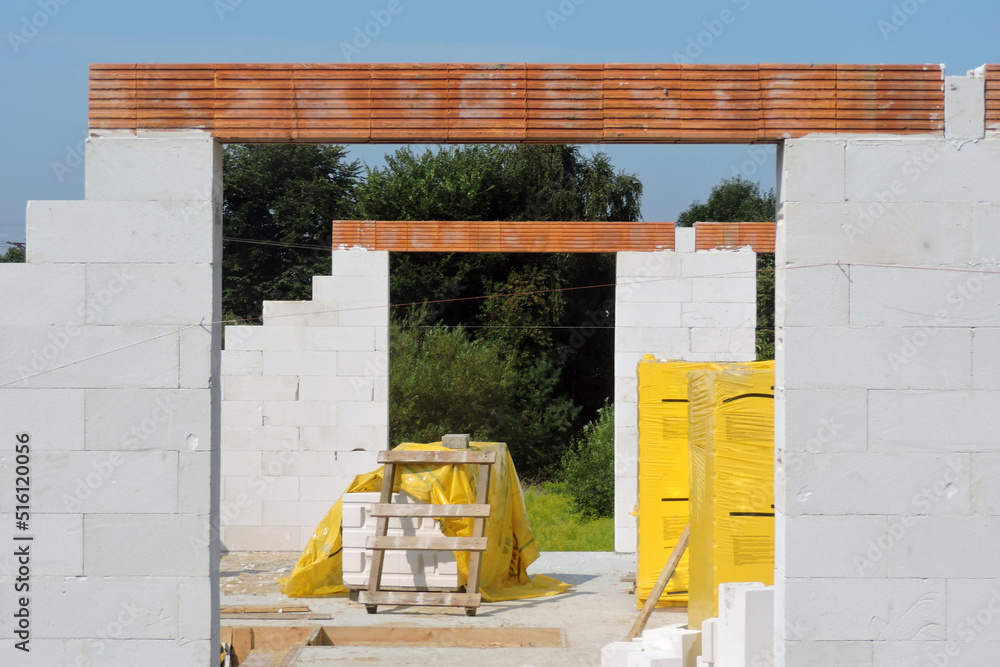 Reinforced brick lintels, floor to ceiling rough window openings and ...