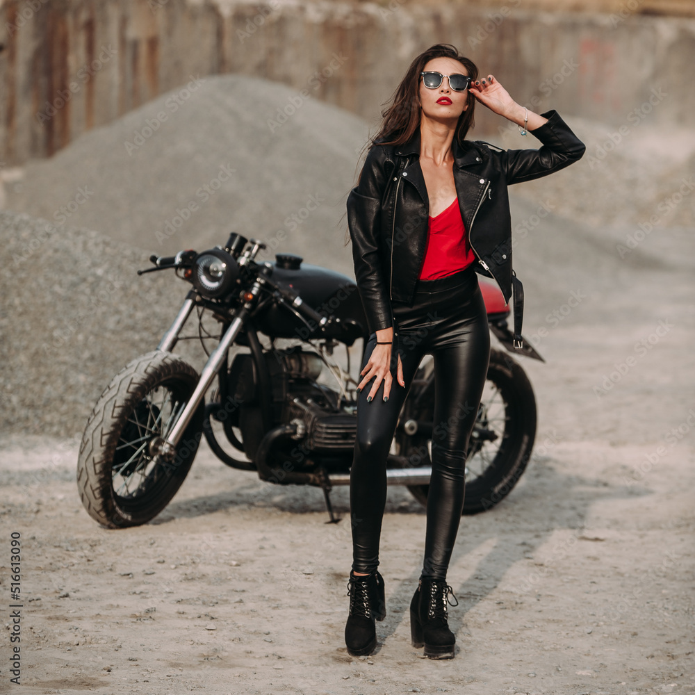 beautiful girl with long dark hair red lips in black jacket and black ...