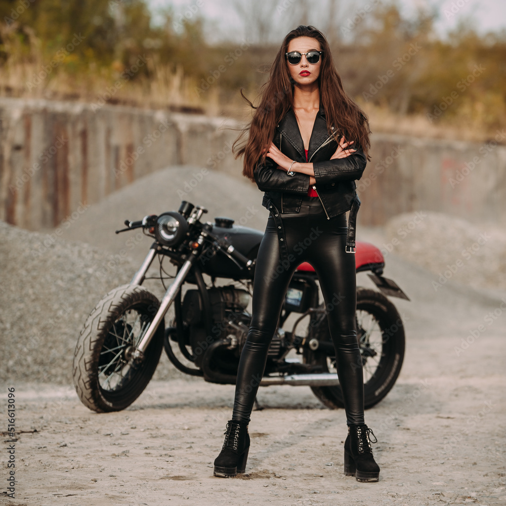 beautiful girl with long dark hair red lips in black jacket and black ...