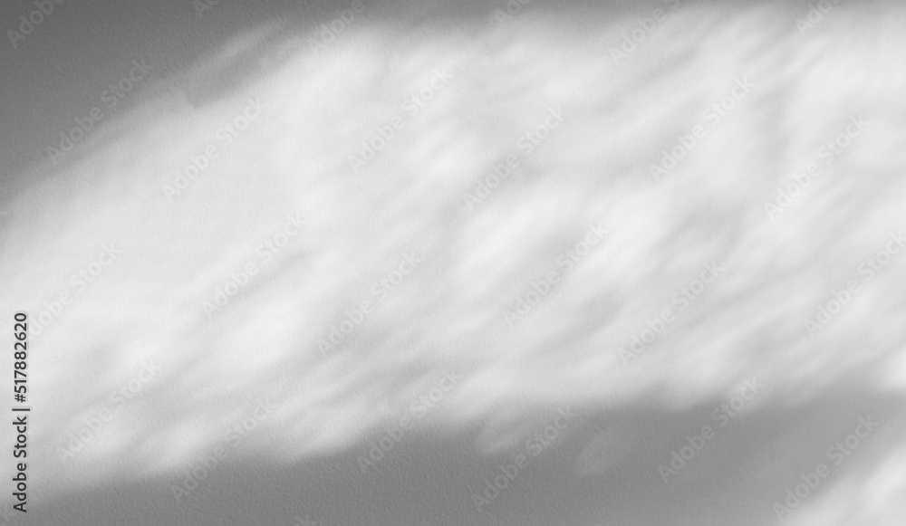 Falling abstract shadow from a window blind on a light background ...