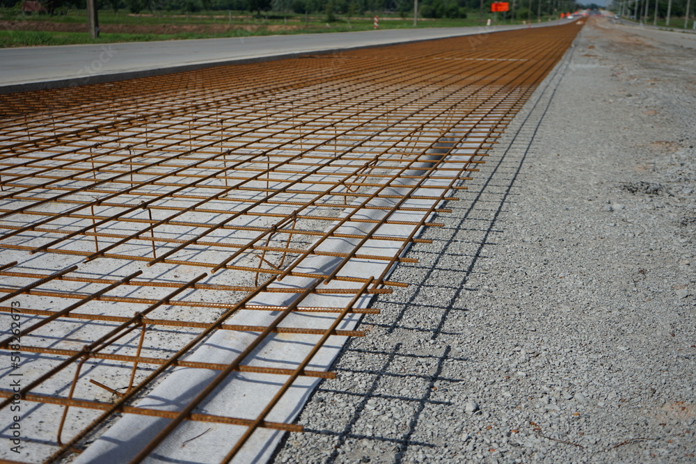 Reinforced concrete road construction and the process of placing the ...