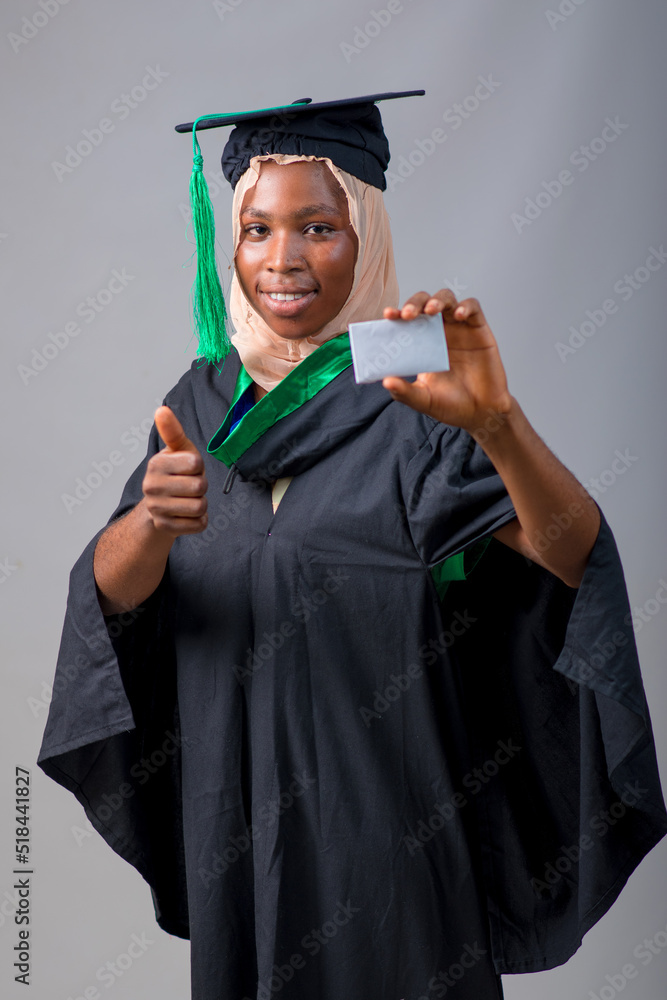 African Nigerian Muslim lady, student or graduand, wearing an hijab ...