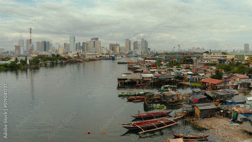 Manila is the capital of the Philippines with slums and poor district ...