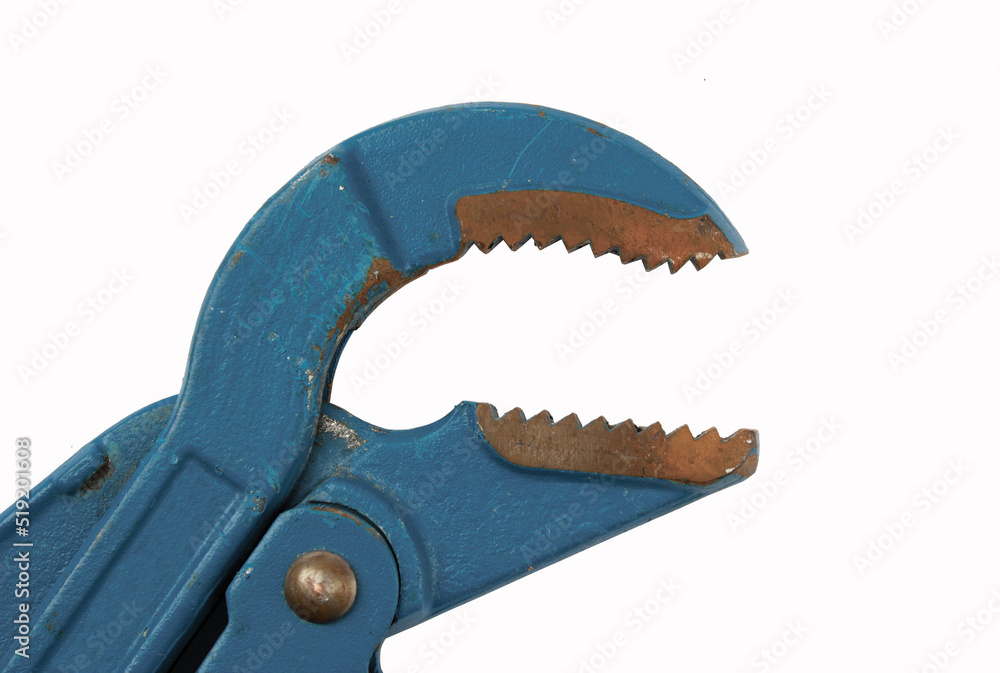 Old adjustable wrench with rust stains. Pipe wrench on a white ...