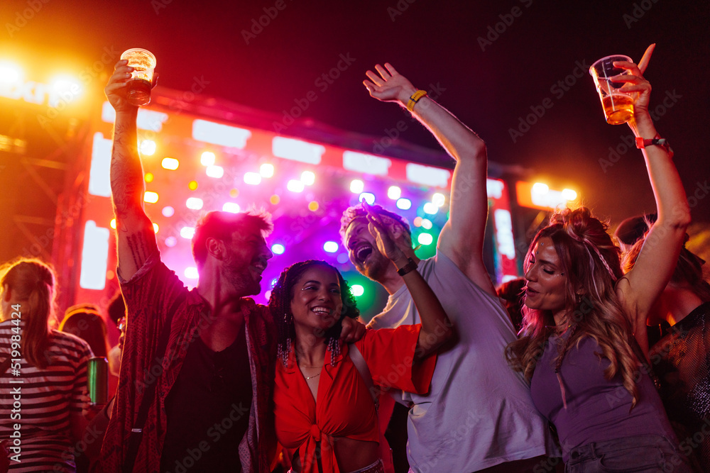 Cheerful crew dancing together and an outdoors festival Stock Photo ...