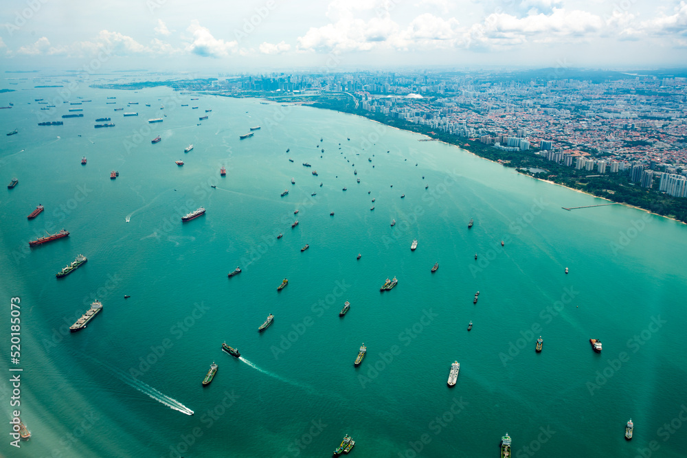 Aerial view from the plane window of the Singapore Harbor which has ...