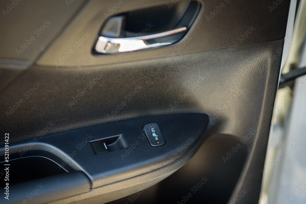 Foto de Stock Car door control right rear panel. Leather new car ...