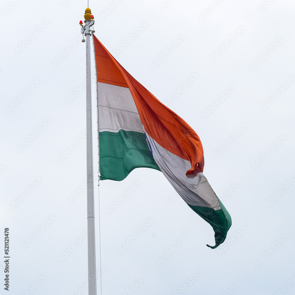 India flag flying high at Connaught Place with pride in blue sky, India ...
