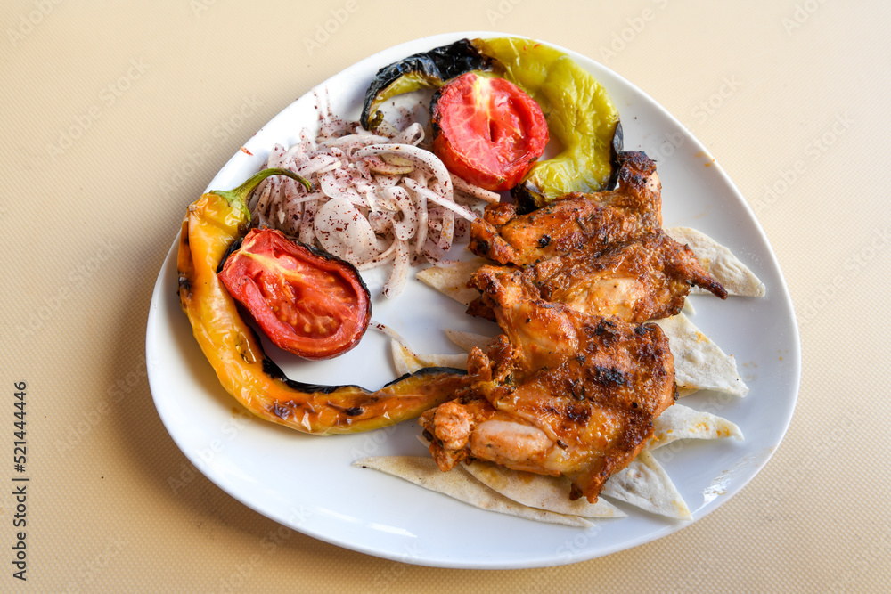 Chicken wings barbeque in a dish with BBQ grill sauce . Izgara tavuk ...