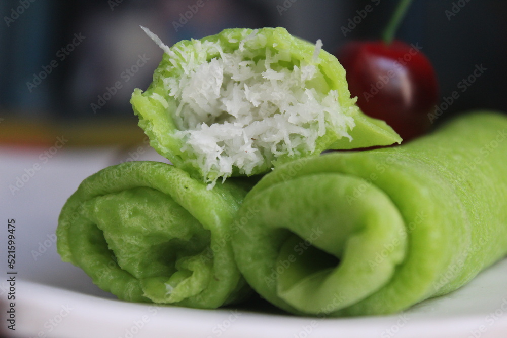 "Dadar gulung" is a traditional Indonesian snack that is identical to ...