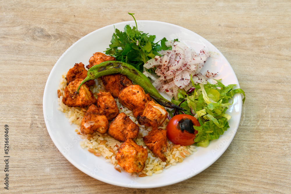 Chicken wings barbeque in a dish with BBQ grill sauce . Izgara tavuk ...