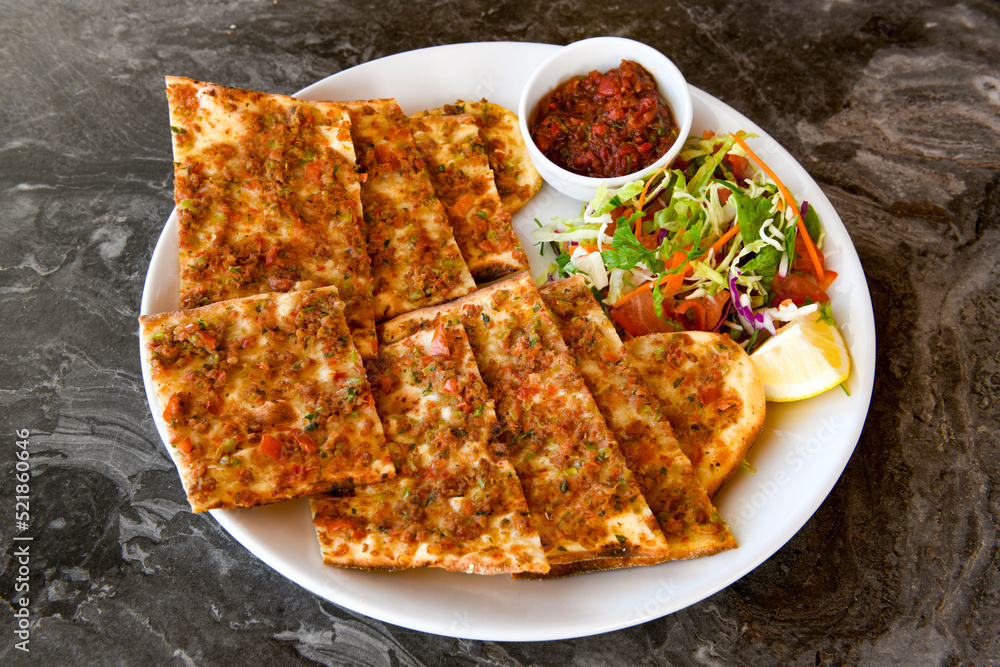 Photo Stock Turkish pita with minced cubed meat and cheese (Turkish ...