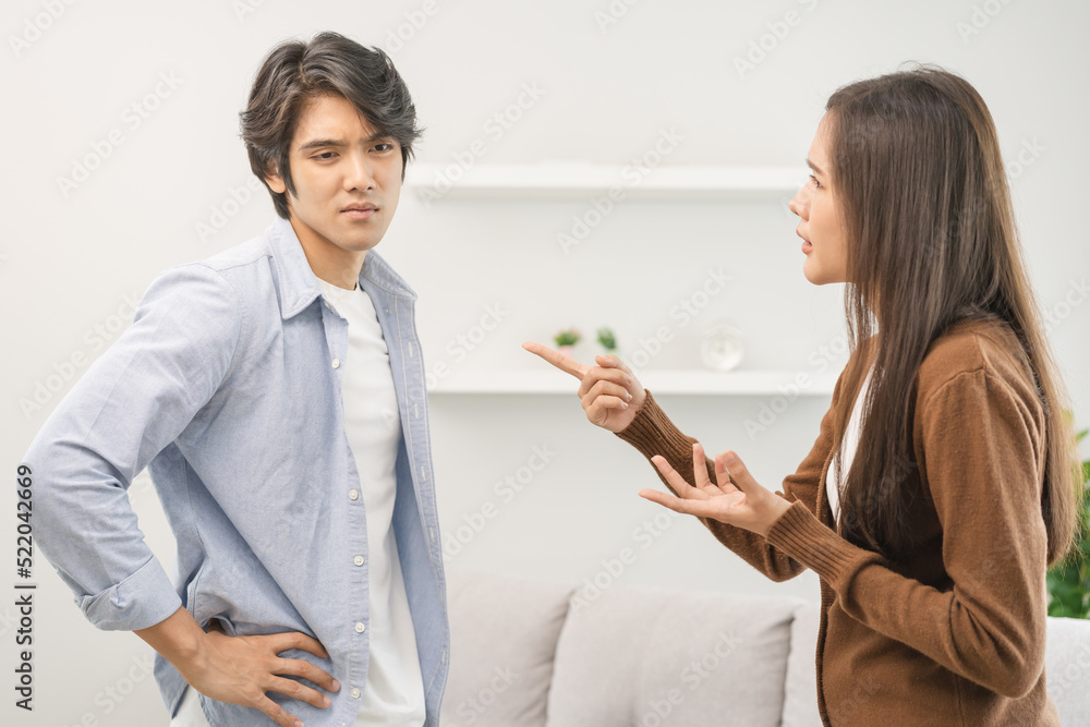Asian young couple fight standing on white background, relationship in ...