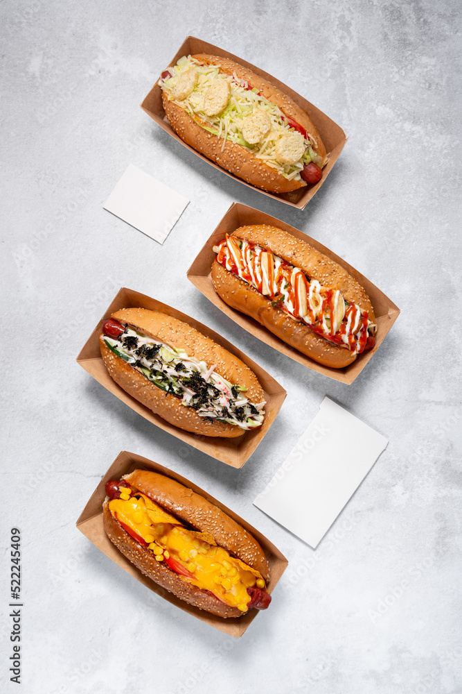 Fast food hot dog banner on a light grey stone textured background ...