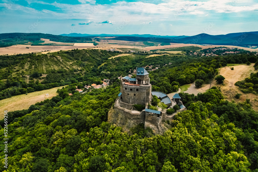 Aerial view of medieval ruined Holloko castle, UNESCO world heritage ...