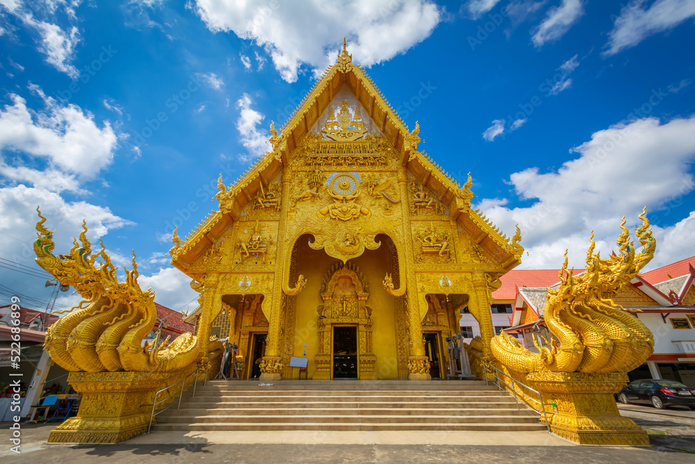 The gold temple with a gold serpent has seven heads on both sides of ...