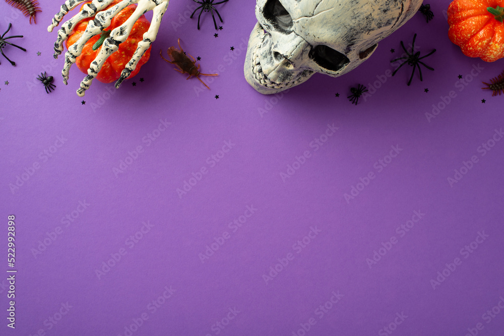 Halloween spooky decorations concept. Top view photo of skull skeleton ...