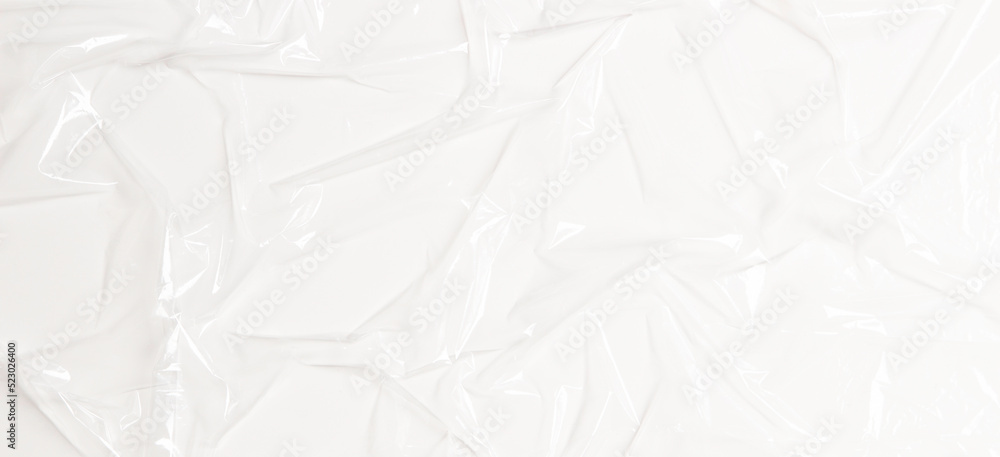 Wrinkled plastic wrap on white color background. Crumpled transparent ...
