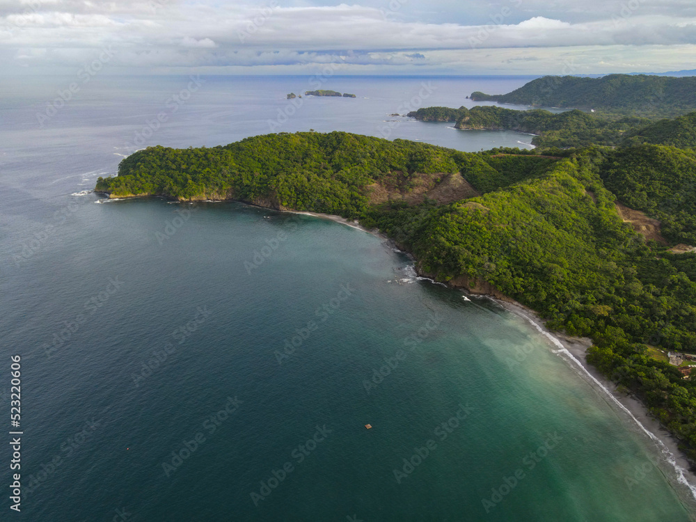 Drone view of Playa Danta, Brumel Island, and Zapotal point of Finca ...