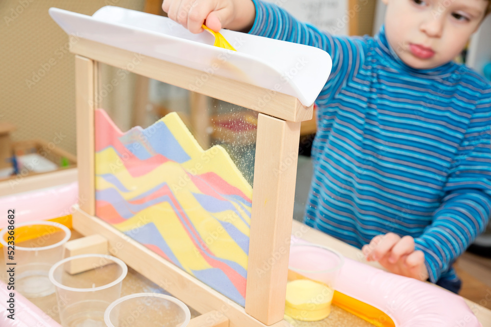 Colorful calming sand. Sand art frame for relaxing feeling pre-school ...