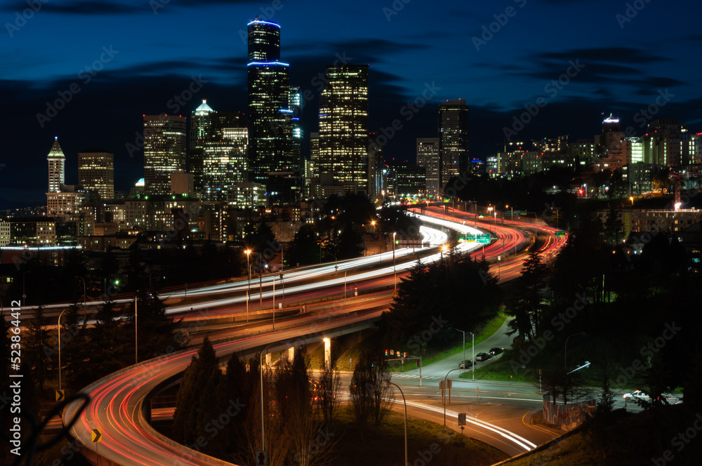Long exposure shot of night traffic at Interstate 5 in front of Seattle ...