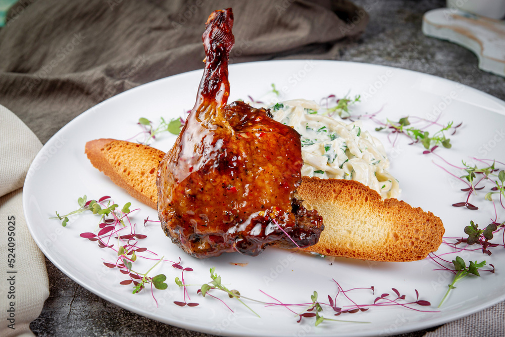 Smoked roasted rabbit leg. Served with mousse Three cheese, crusty ...
