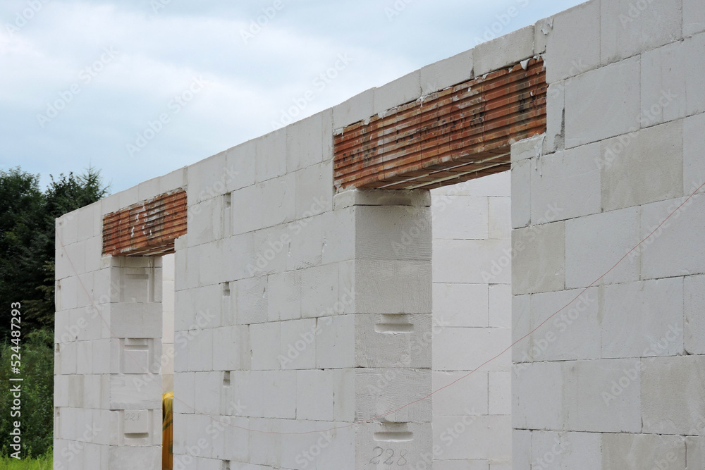 Reinforced brick lintels, rough window openings and walls made of ...