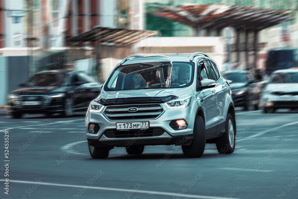 SUV car in motion. Ford Escape third generation moving on the street ...