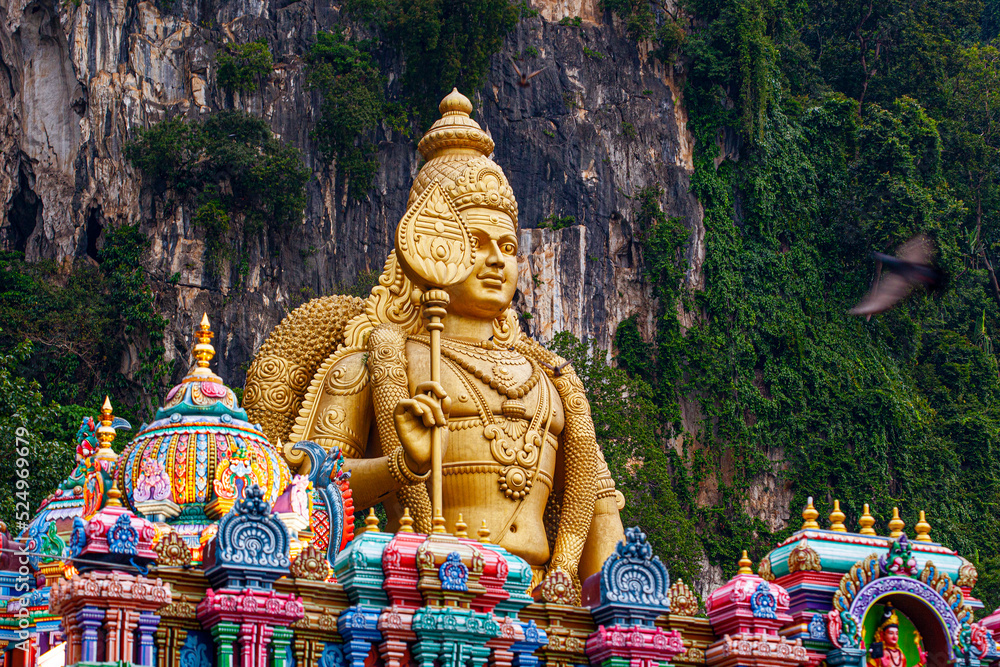 Big Hindu god statue of Murugan at Batu Caves Hindu Temple landmark and ...