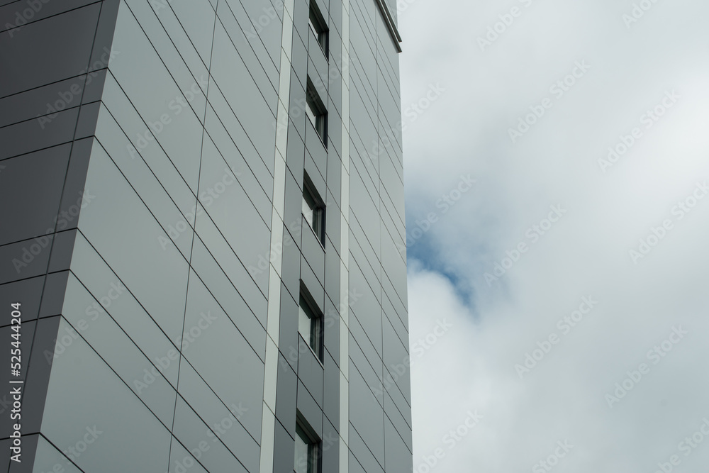 The exterior wall of a contemporary commercial style building with ...