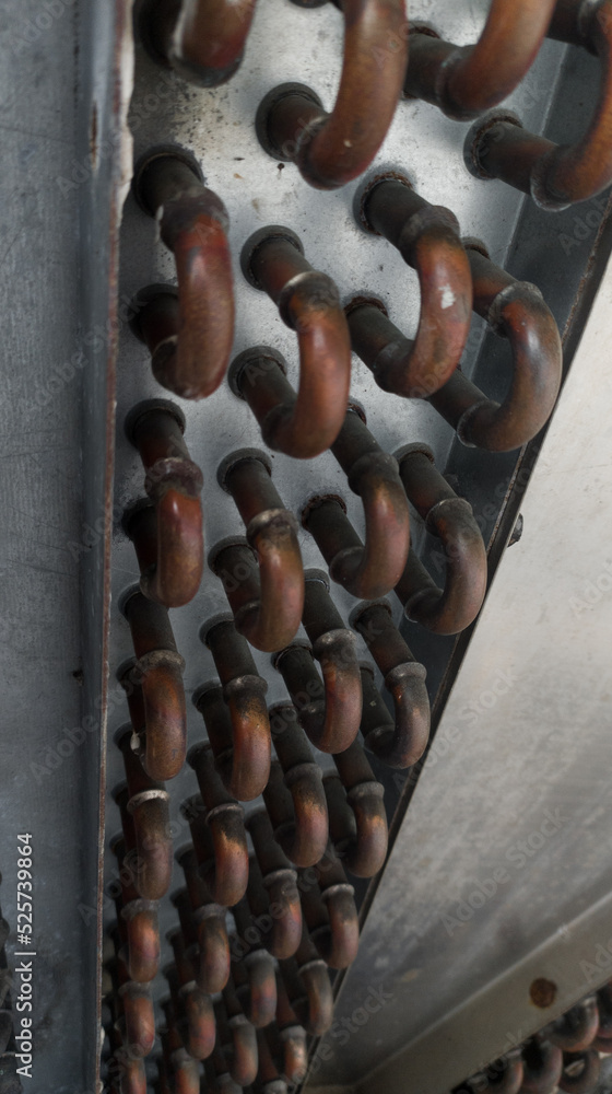 condenser pipe bends to circulate refrigerant gas in the chiller ...
