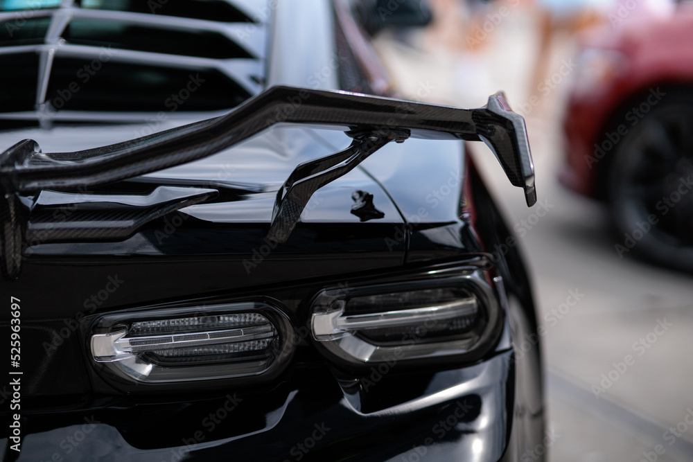 Sport car at the start. Grille on the rear window of the car. Luxury ...
