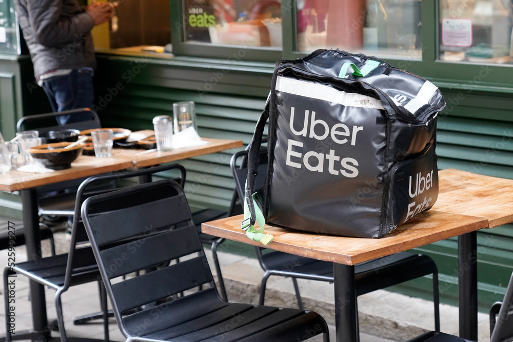 Uber eats bike bag logo band and text sign delivery man with backpack ...