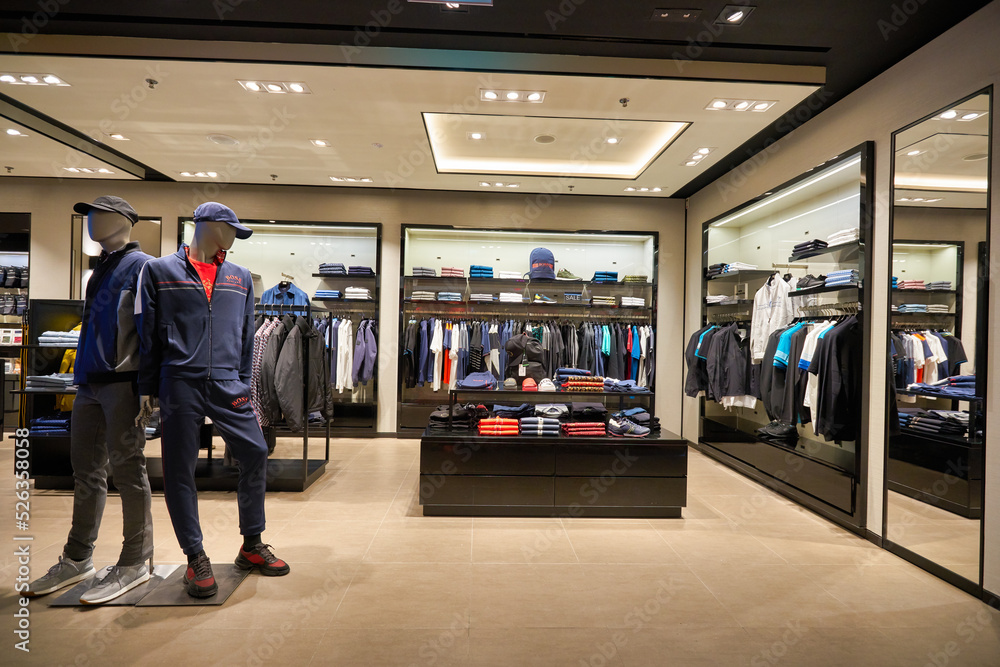 SINGAPORE - CIRCA JANUARY, 2020: clothes on display at Hugo Boss store ...