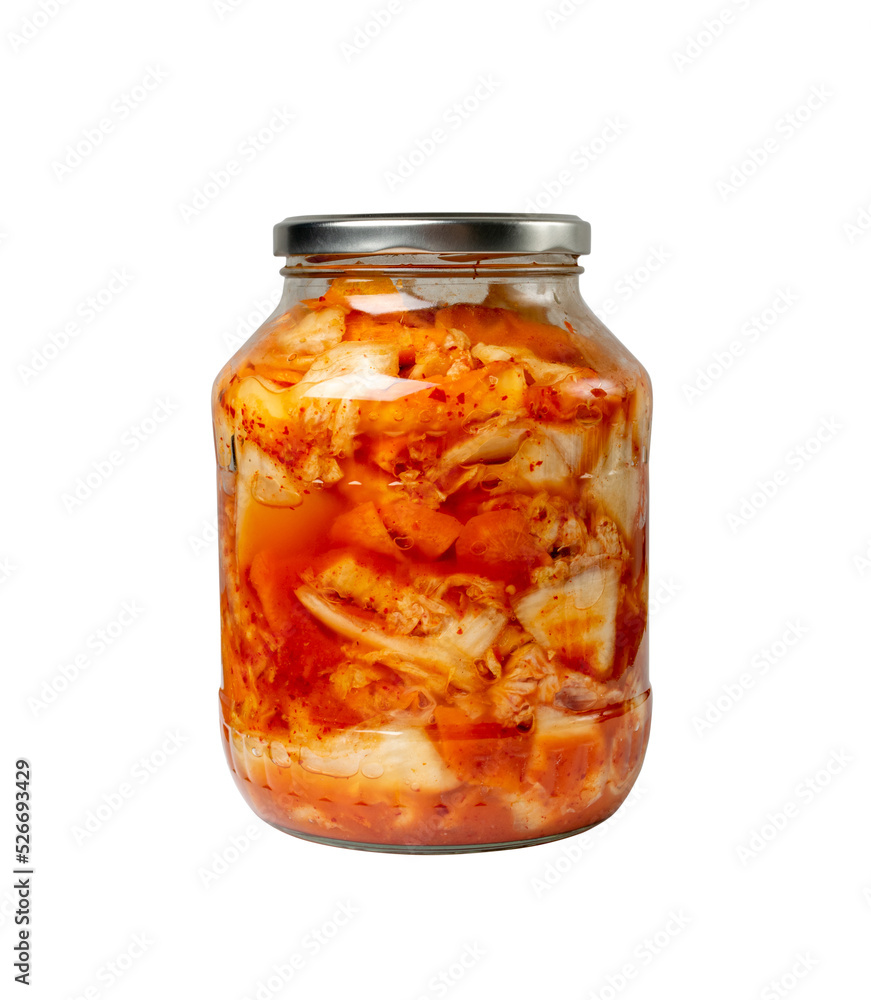 Kimchee in a glass jar isolated. Spicy kim chi, hot fermented napa ...