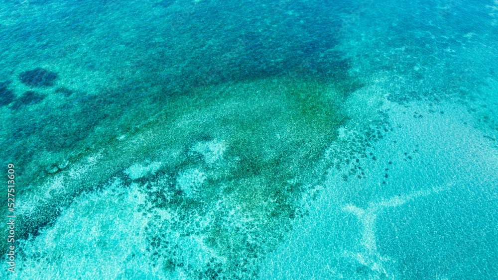 Birds eye view of Coral Triangle coral reef with perfect turquoise aqua ...