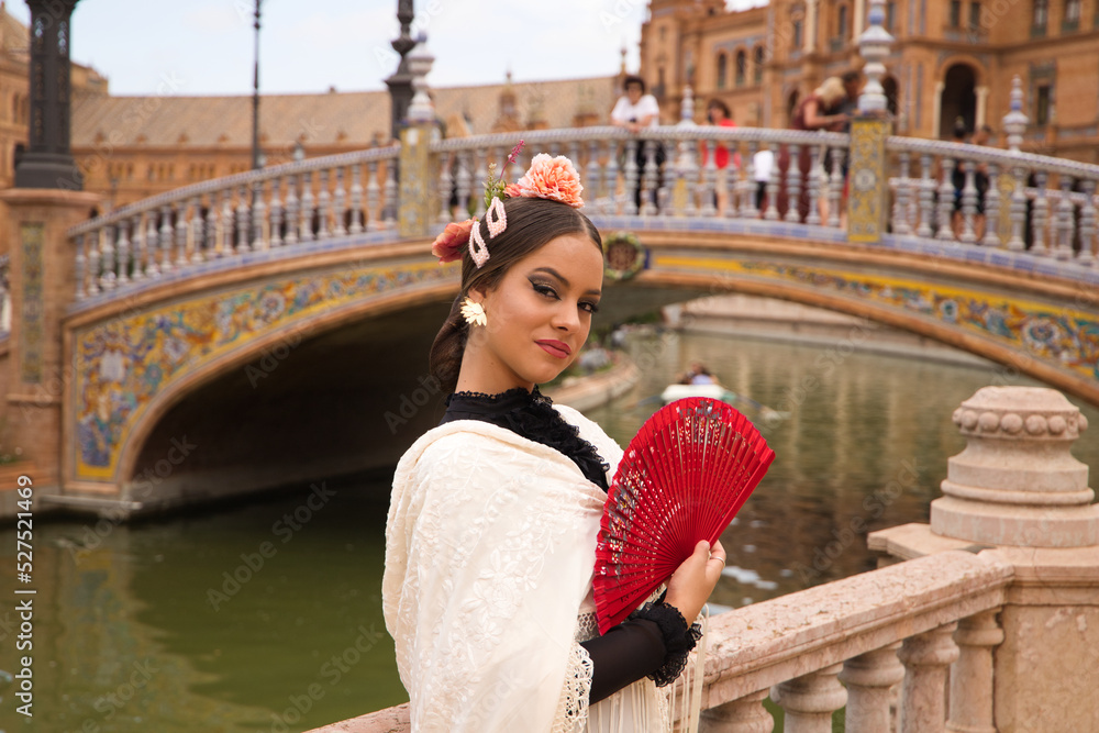 Beautiful teenage flamenco dancer with brunette hair and dressed in ...