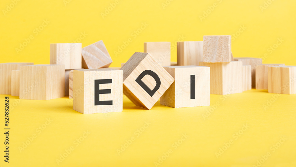 EDI. Electronic. Data. Interchange symbol. wooden blocks with lettter ...