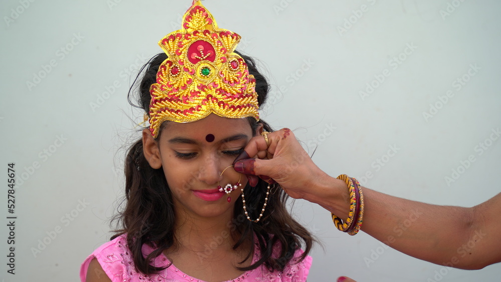 Stock-Foto „Durga Puja Look Photo-shoot based on agomoni Festival with ...
