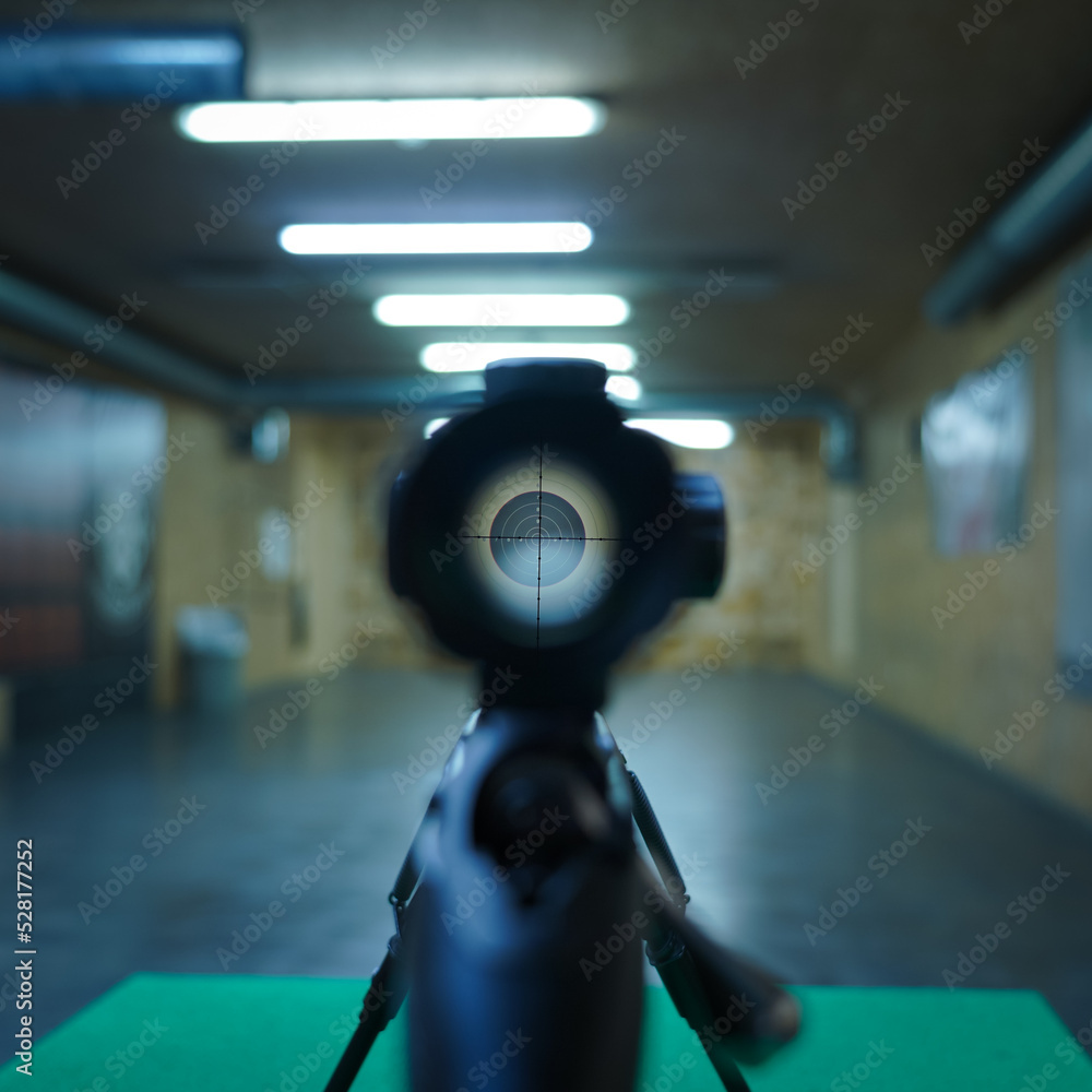 Aiming sniper rifle in shooting range. Stock Photo | Adobe Stock