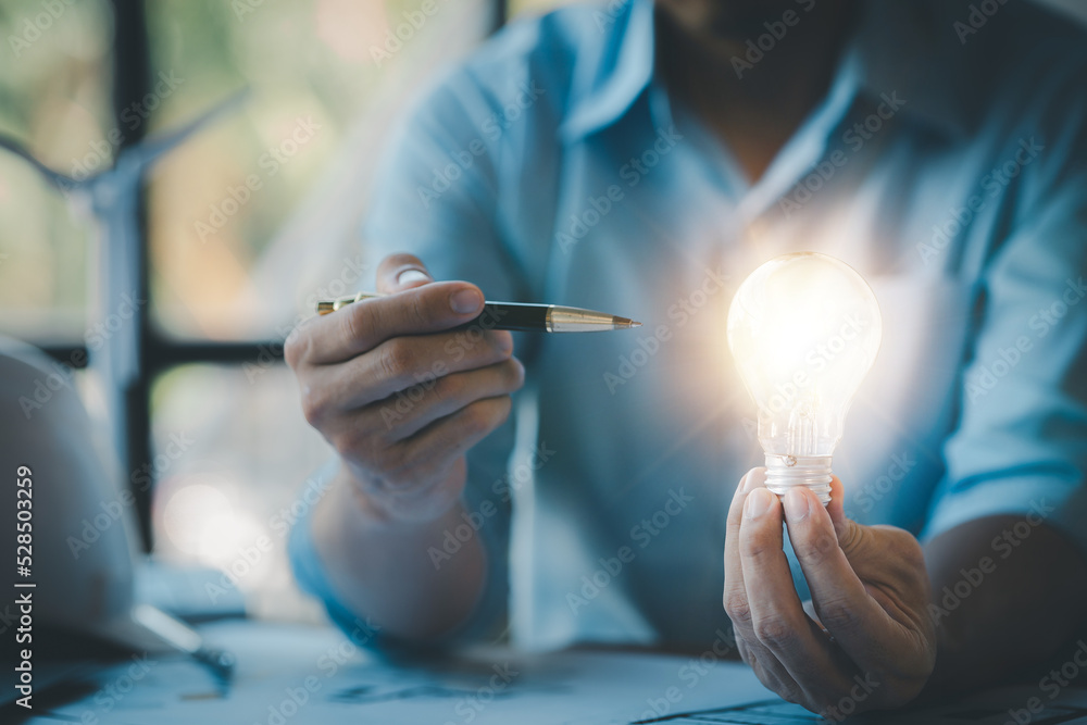 Architects holding light bulbs, Creative new idea. Innovation, finding ...