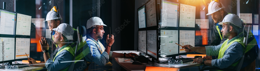 Concept of industry 4.0. Wide image of engineers control of industry ...