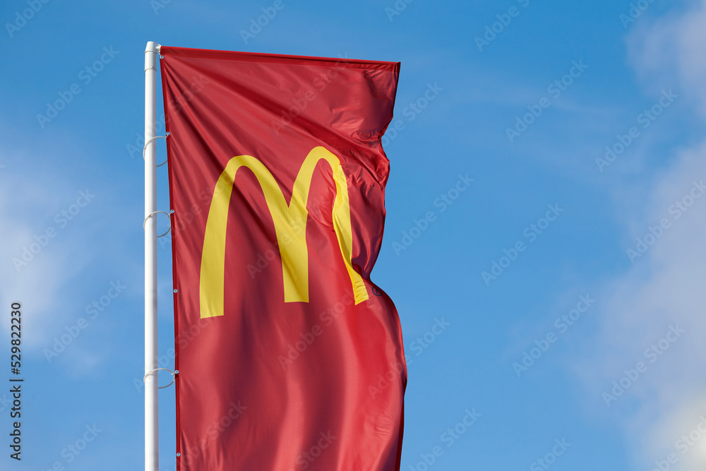 McDonalds red flag with logo of fast food restaurant branch, roadside ...