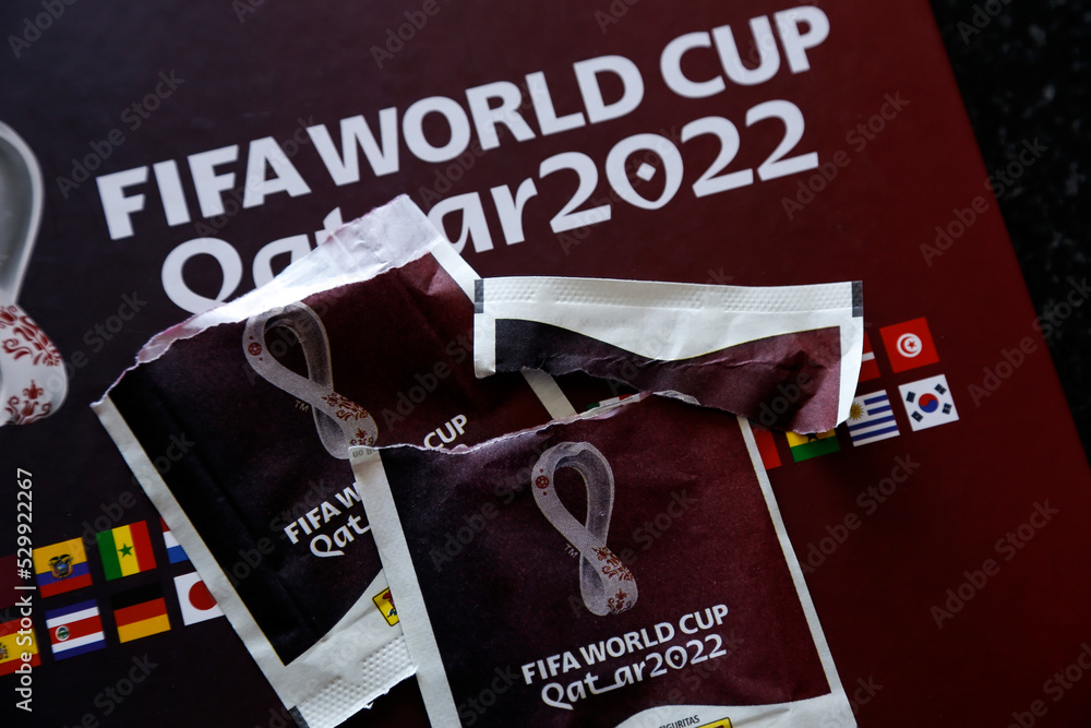 open stickers pack and Panini 2022 FIFA World Cup Qatar Official licensed sticker album Stock ...