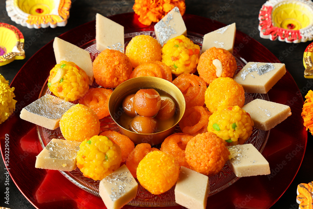 Diwali sweets Mango chum chum barfi petha Laddu Jalebi peda Indian ...